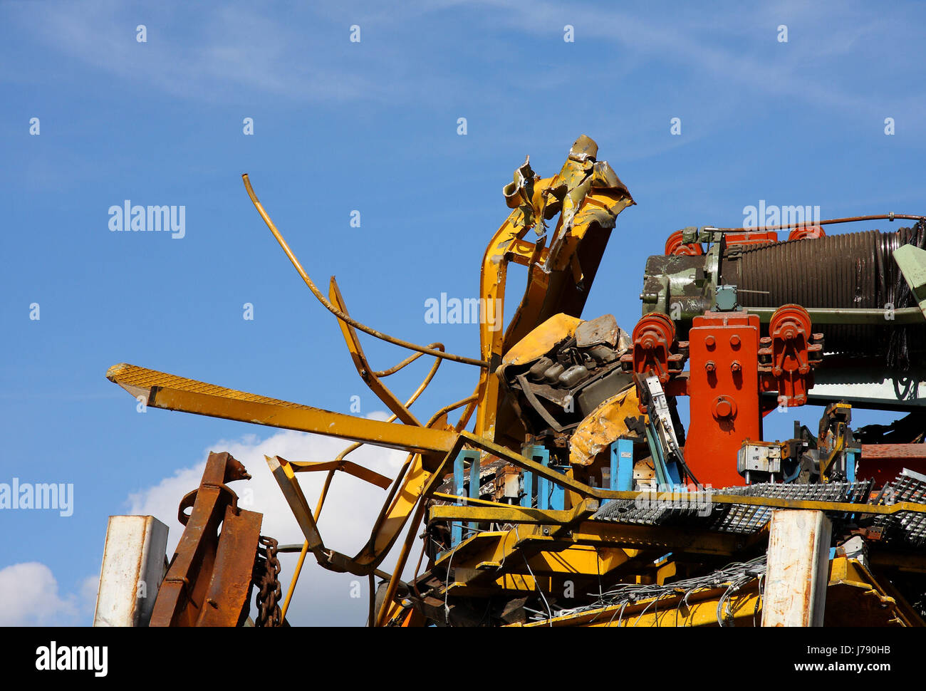 blue metal trash scrap firmament sky scrap metal forklift fork-lift ...