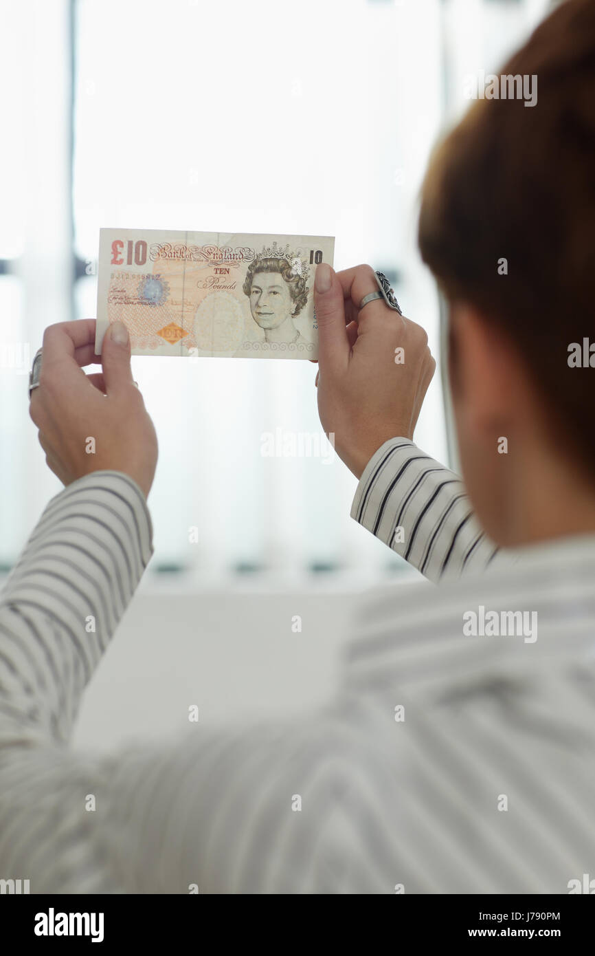 woman test checking testing sample british watermark money pound woman ...