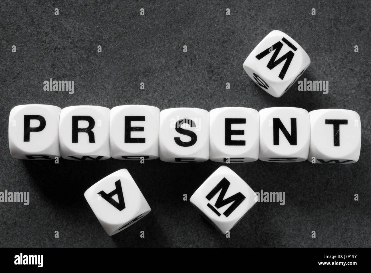 word present on white toy cubes Stock Photo - Alamy