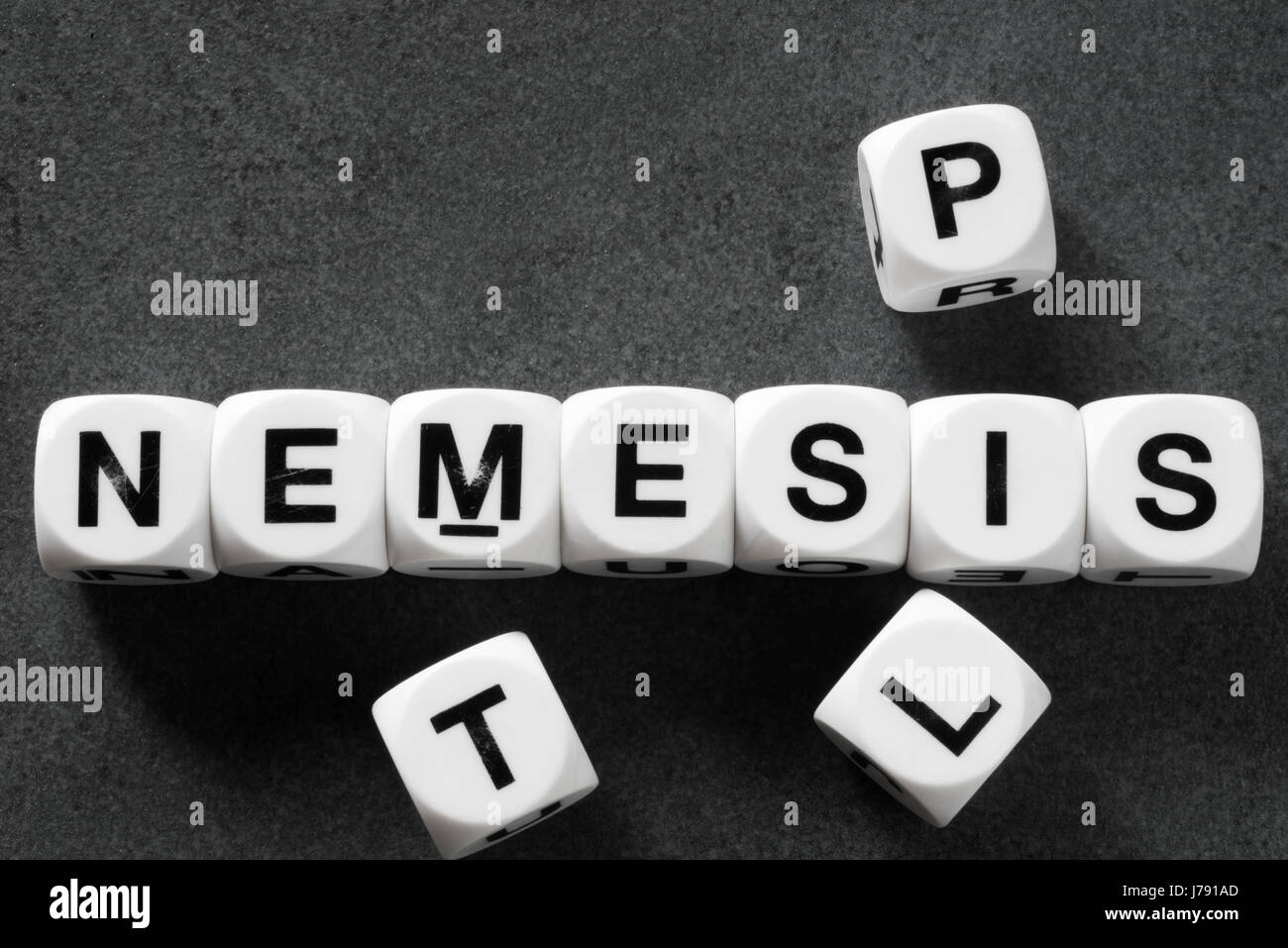 word nemesis on white toy cubes Stock Photo - Alamy
