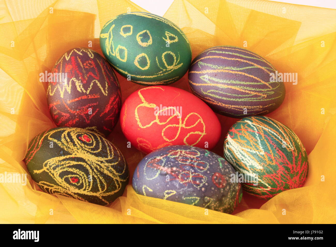 seven colorful easter eggs Stock Photo - Alamy