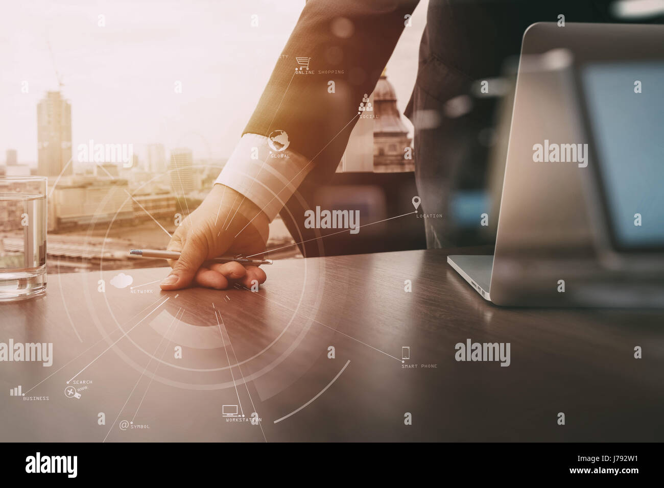 businessman working with mobile phone and digital tablet and laptop ...