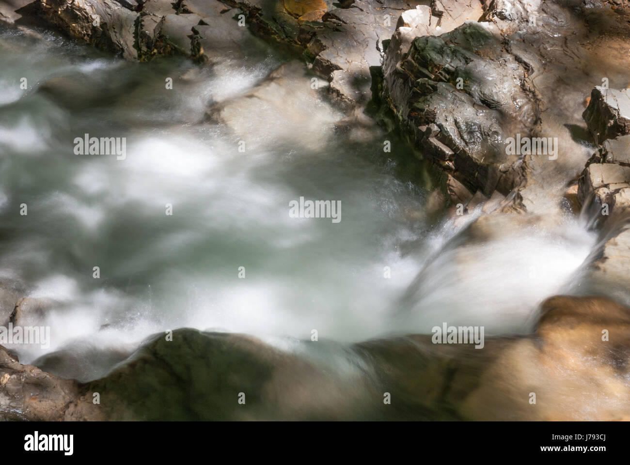 Natura 2000, Poland, Europe, Water flowing over rocks in mountain ...