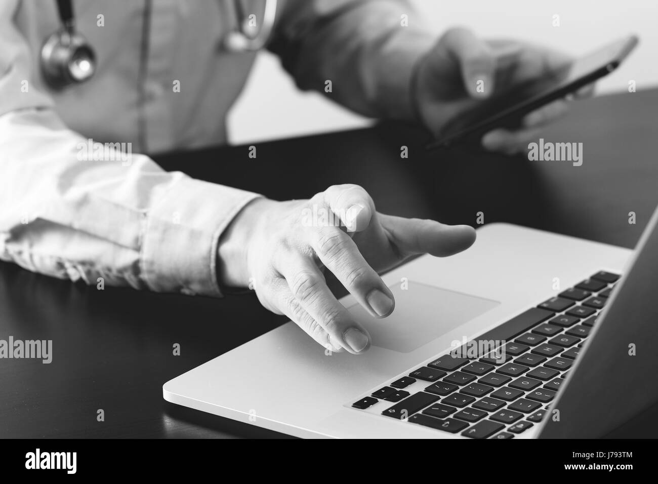 Doctor work on computer Black and White Stock Photos & Images - Alamy