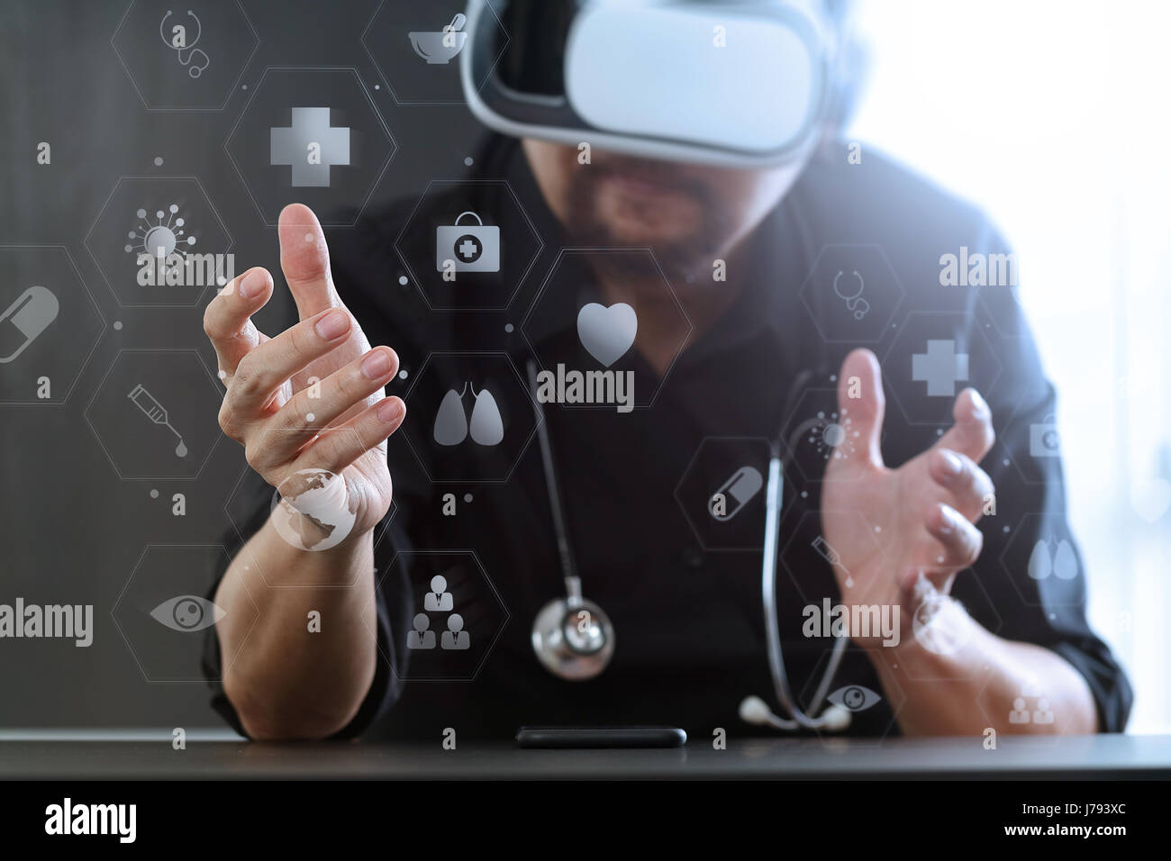 smart doctor wearing virtual reality goggles in modern office with ...
