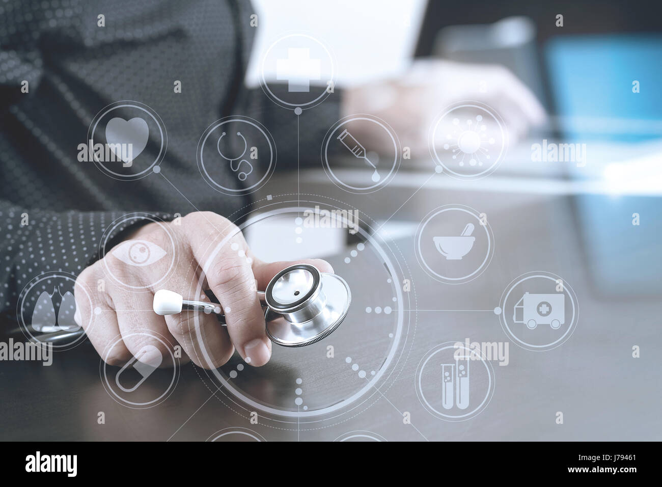 Doctor laptop stethoscope working desk hi-res stock photography and ...