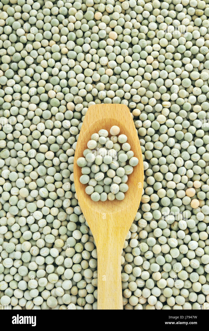 green raw peas wooden pea spoon still life food aliment tool object ...