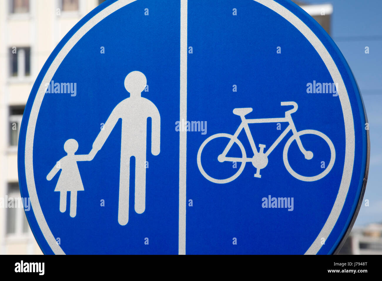 city town urban pedestrian bike cycle lane sign blue individual people ...