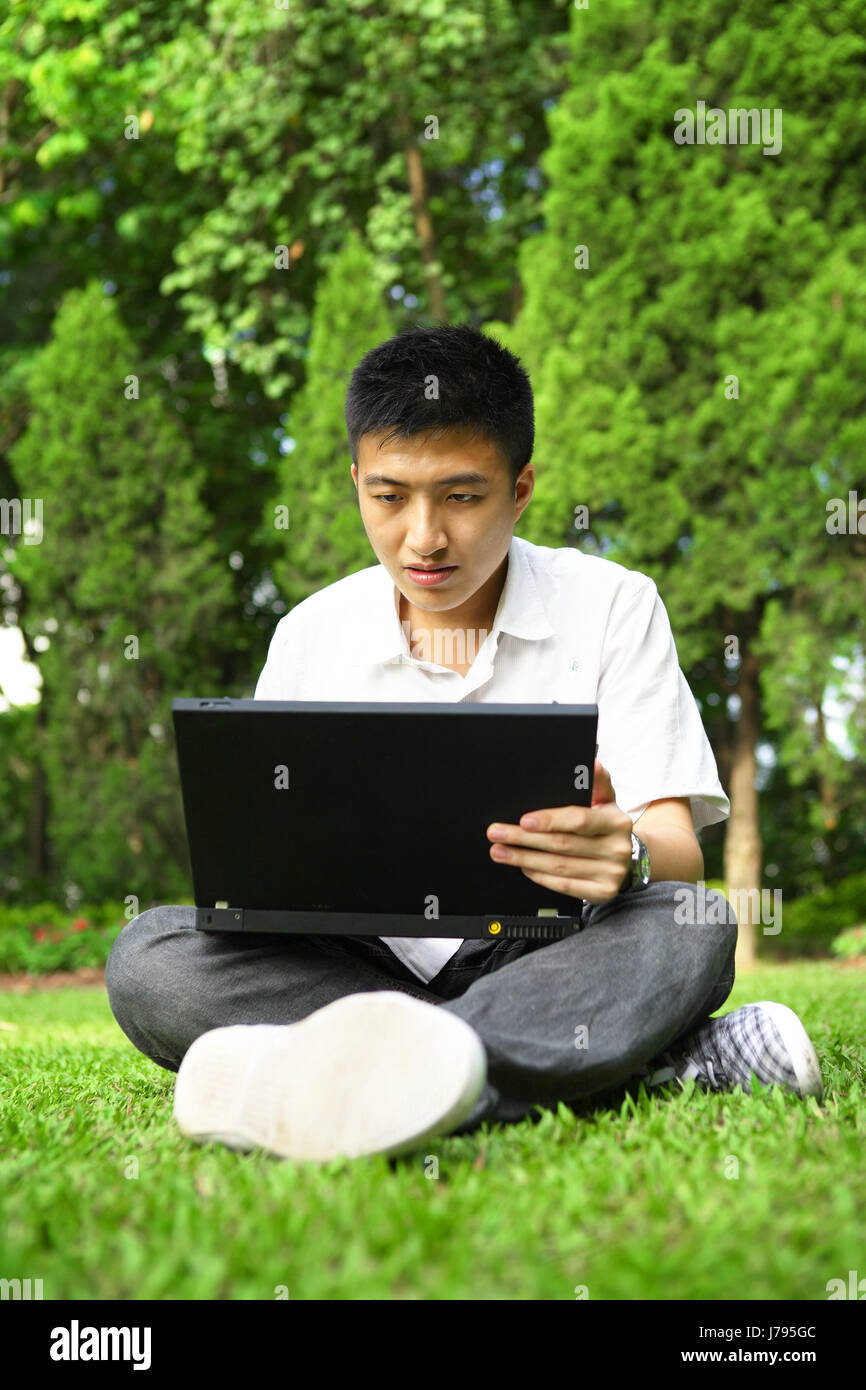 outdoor asian computers computer man blue humans human beings people ...