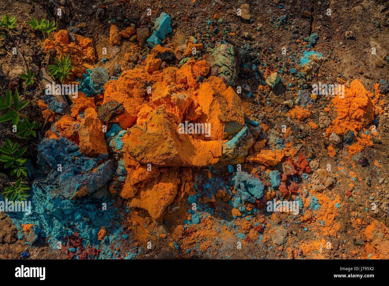 Multi-colored garbage on the ground Stock Photo - Alamy