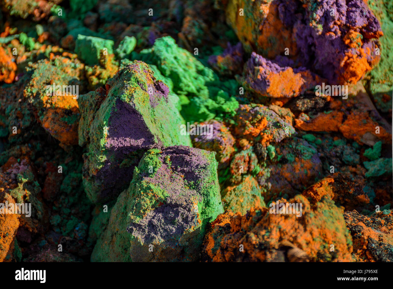 Multi-colored garbage on the ground Stock Photo - Alamy