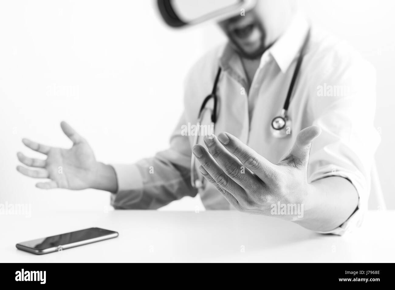 smart doctor wearing virtual reality goggles in modern office with ...