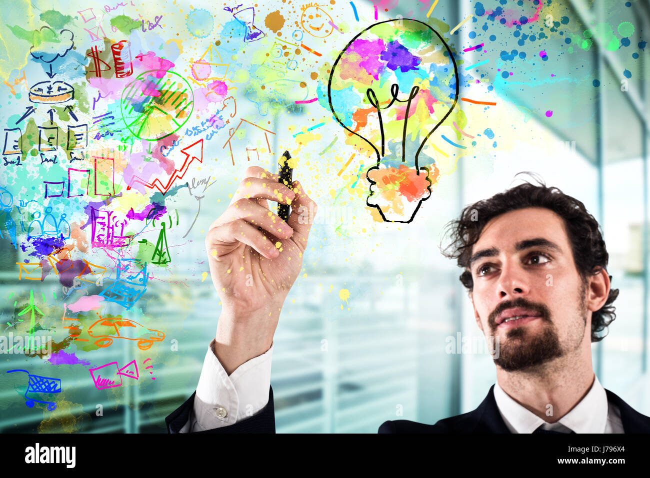 Businessman draws a creative business project Stock Photo - Alamy