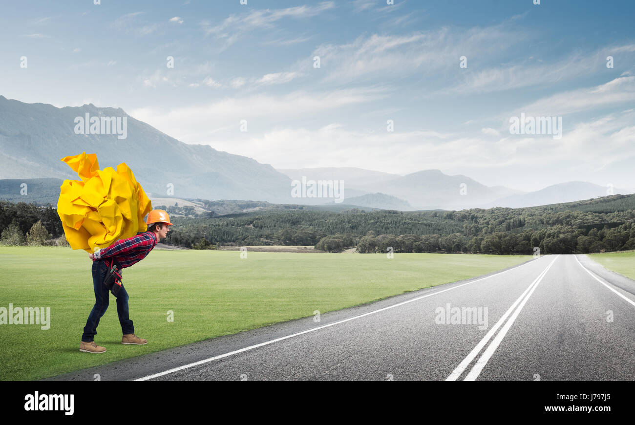 Engineer man carry load Stock Photo - Alamy