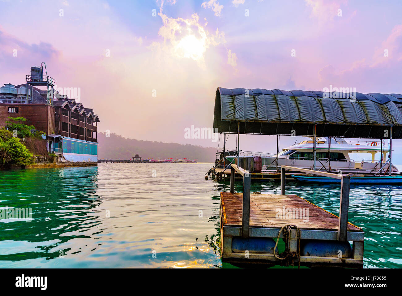 Wooden raft with sunset on Sun Moon Lake Stock Photo - Alamy