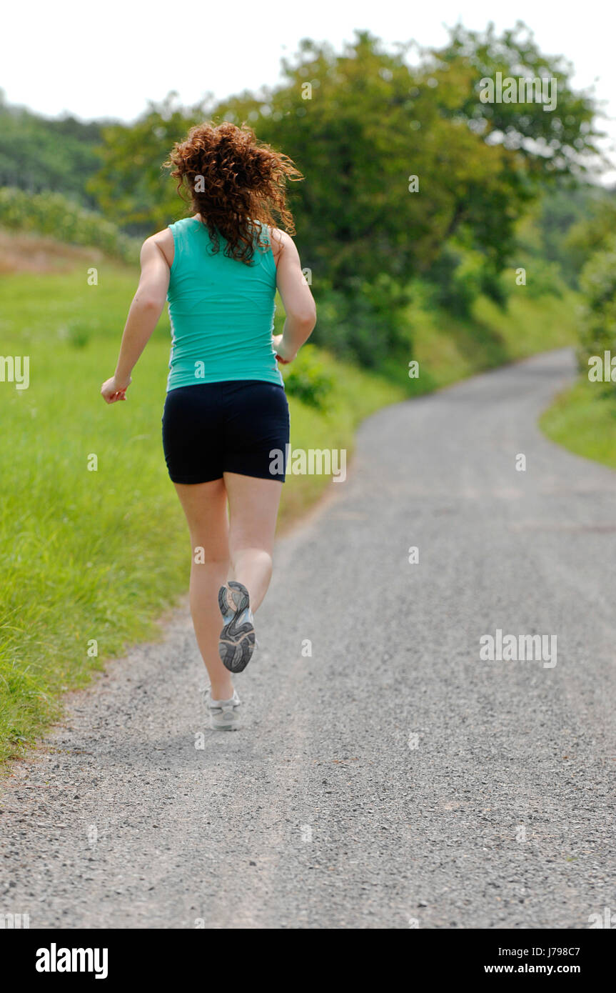 woman sport sports jog move run running runs woman motion postponement ...