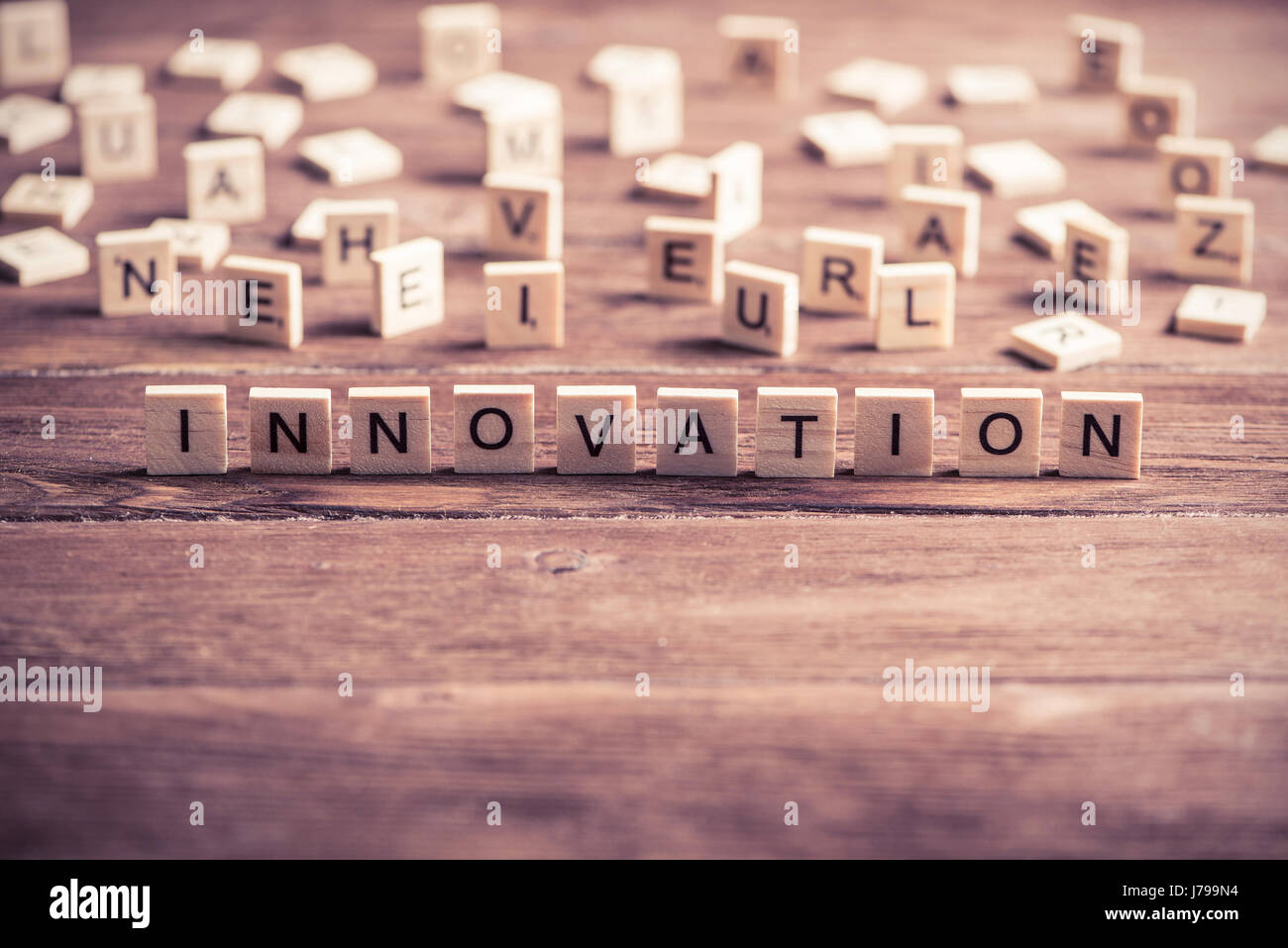 Innovation scrabble word Stock Photo - Alamy