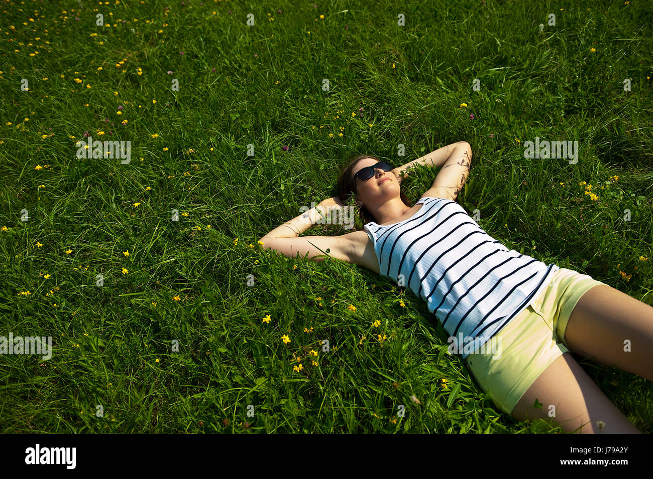 woman relaxed lie lying lies facilitate ease resting relax recover ...