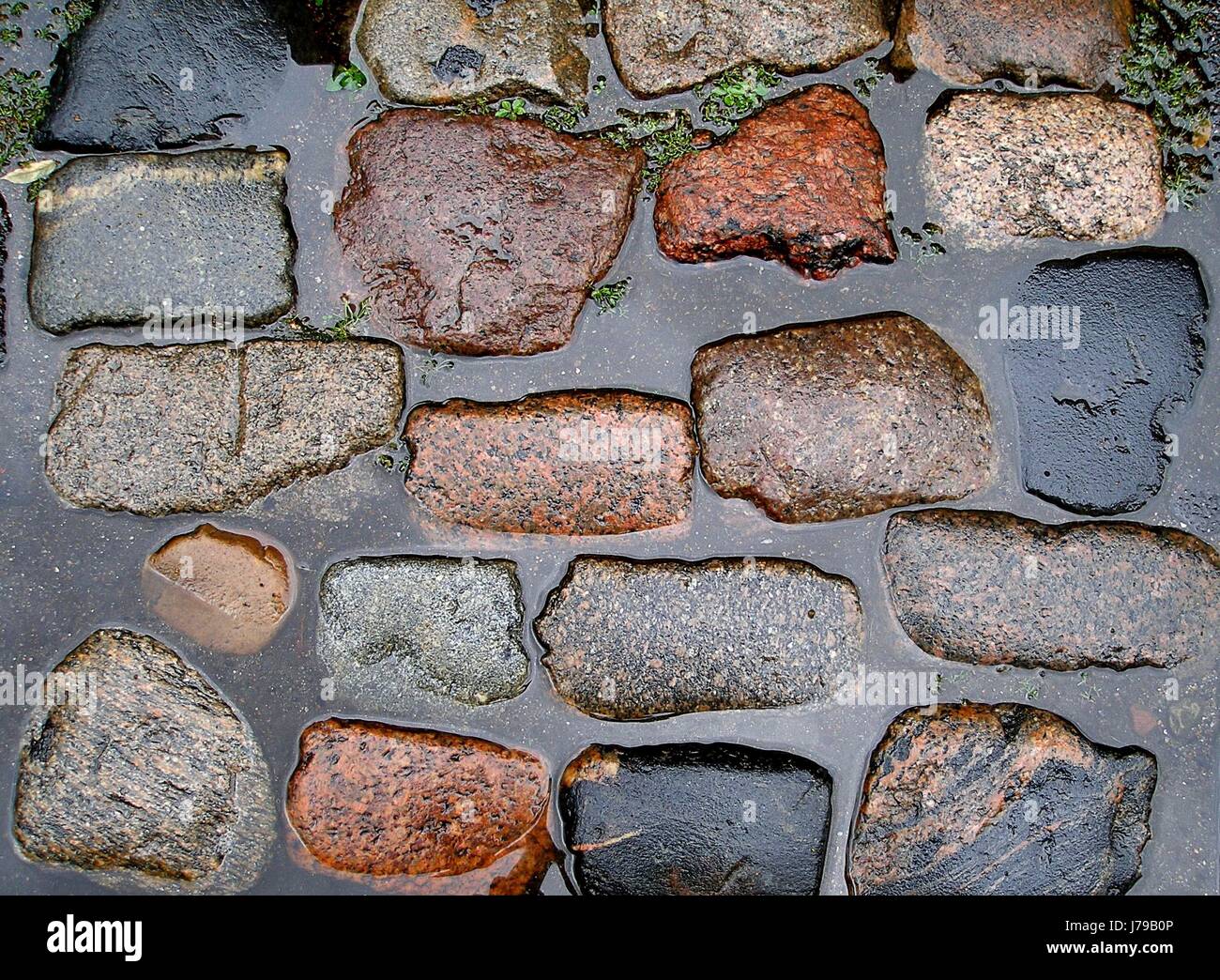 historical old town plaster bouldering puddle bad weather colour ...