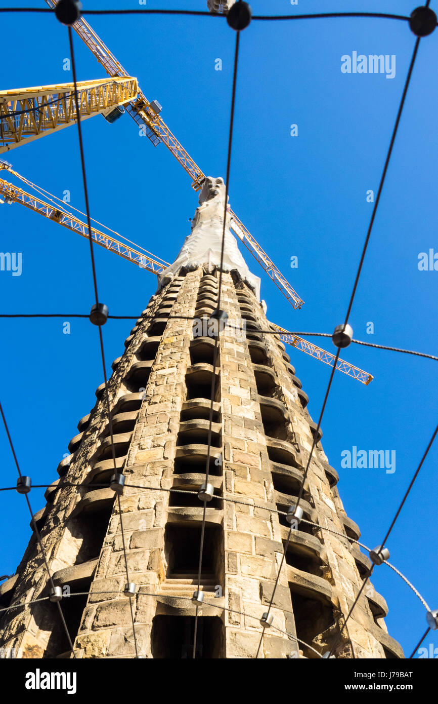 A limestone steeple of Gaudi's Sagrada Familia Basilica in Barcelona ...
