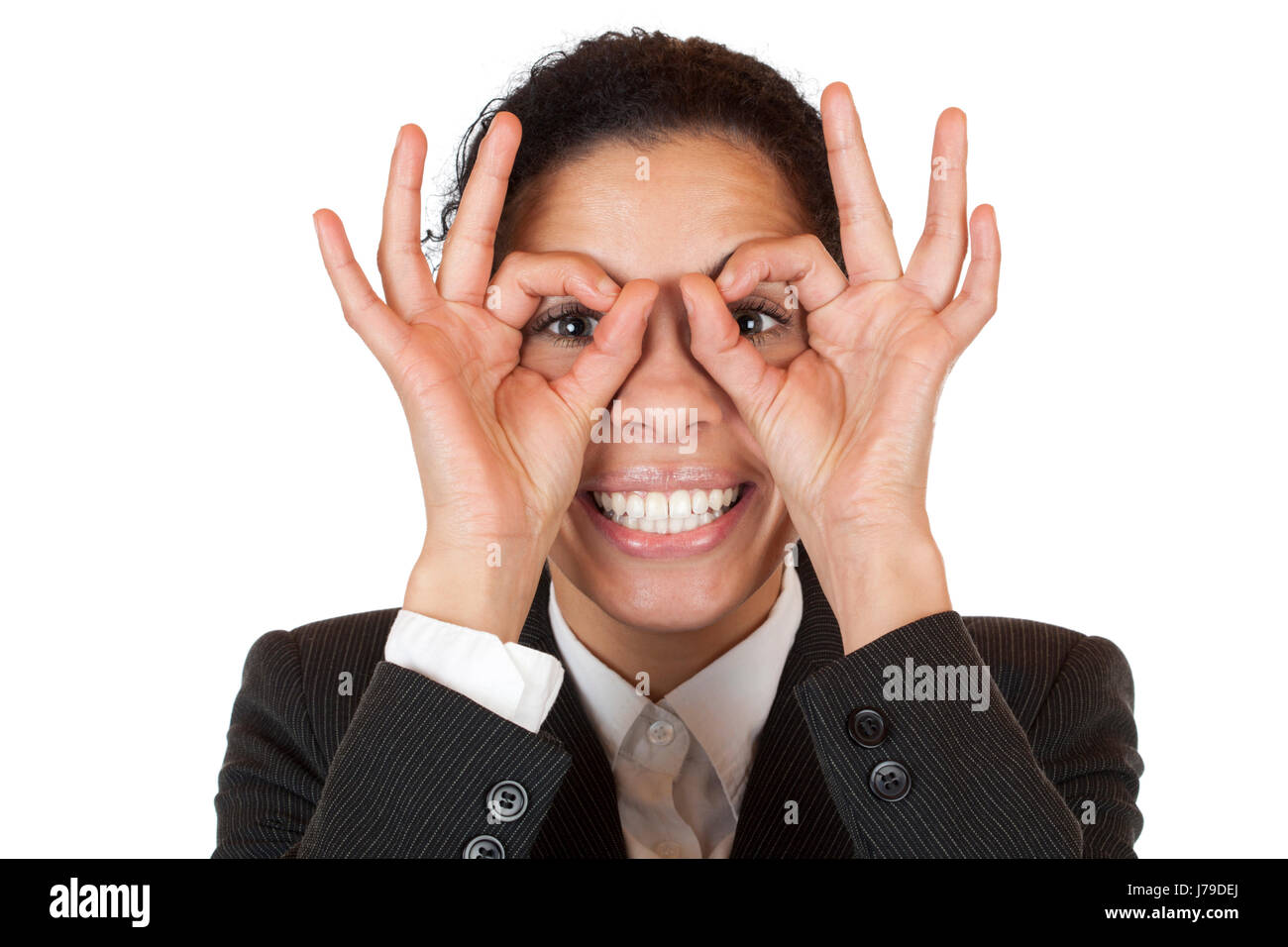 woman makes with fingers binocular Stock Photo - Alamy