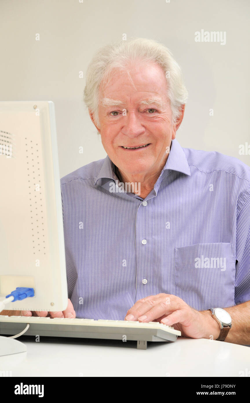 senior with computer Stock Photo - Alamy