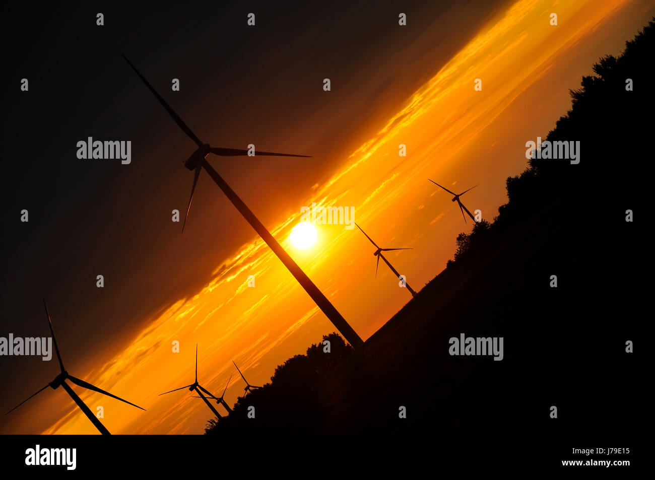 wind turbines during beautiful sunset Stock Photo - Alamy