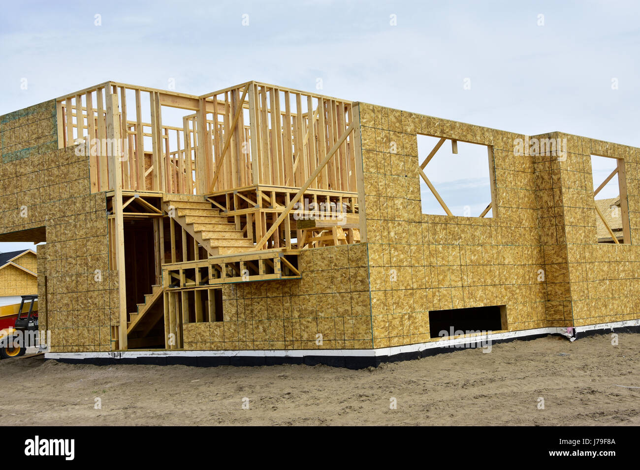 New wood frame homes under construction Stock Photo - Alamy
