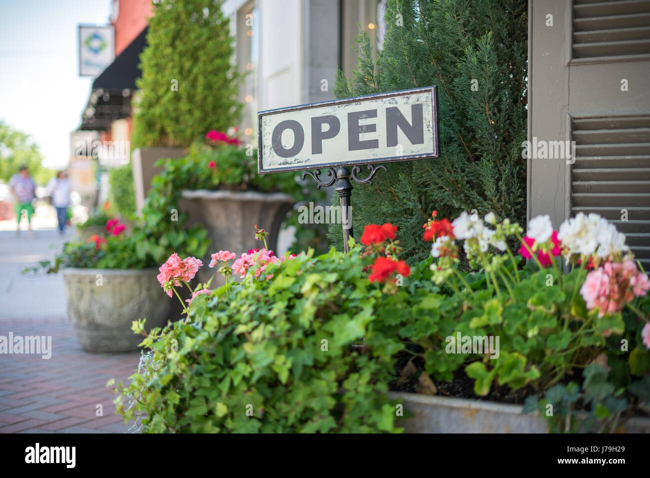 Open sign in a small town retail shop Stock Photo - Alamy