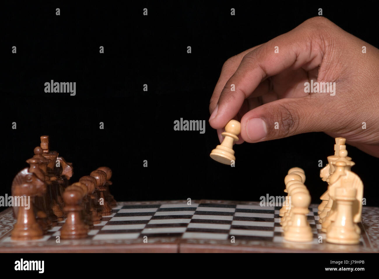 hand wood chess chessboard chessmen first wooden move hand strategy ...