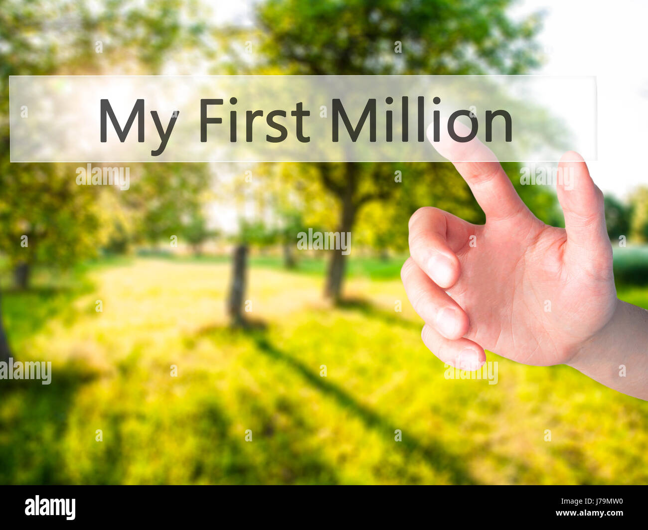 My First Million - Hand pressing a button on blurred background concept ...