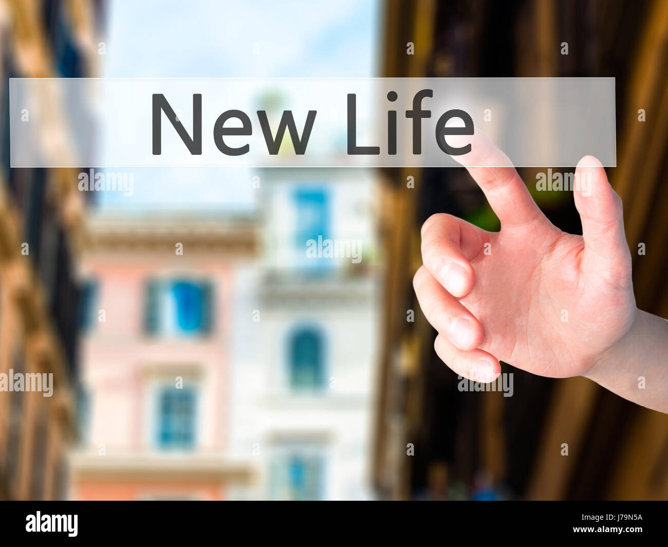 New Life - Hand pressing a button on blurred background concept ...