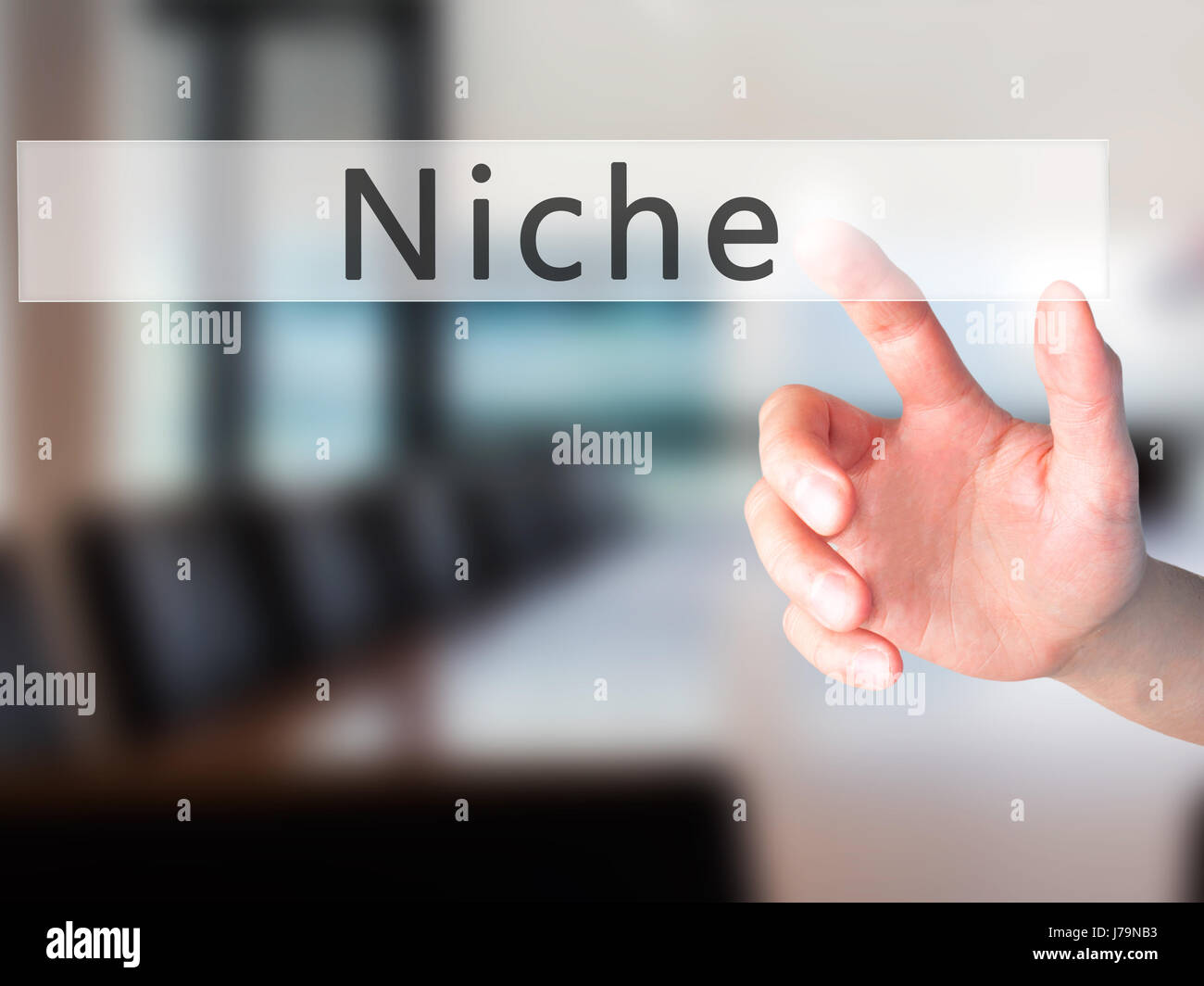 Niche - Hand pressing a button on blurred background concept . Business ...
