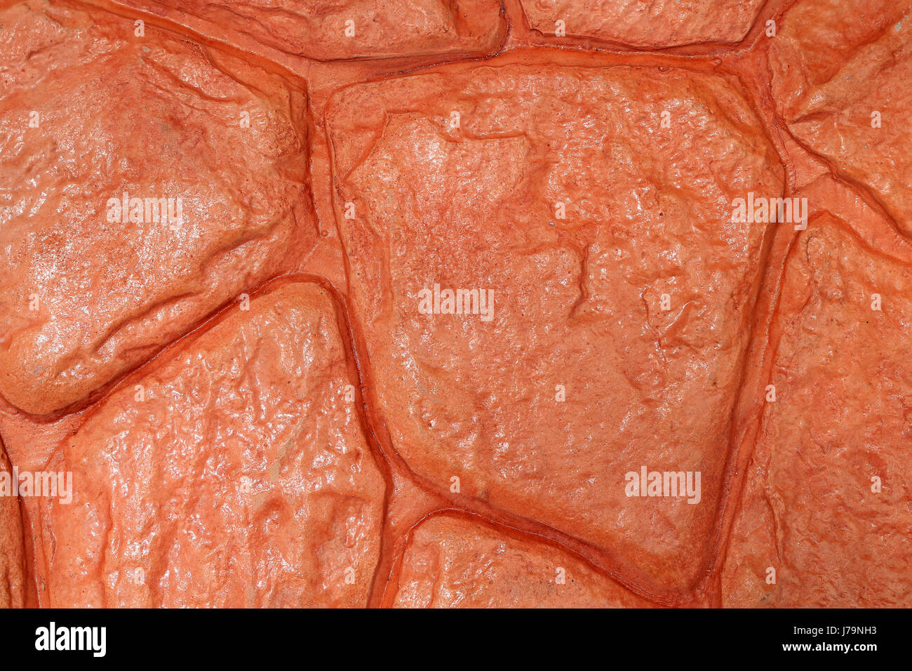 orange stone wall background and texture Stock Photo - Alamy