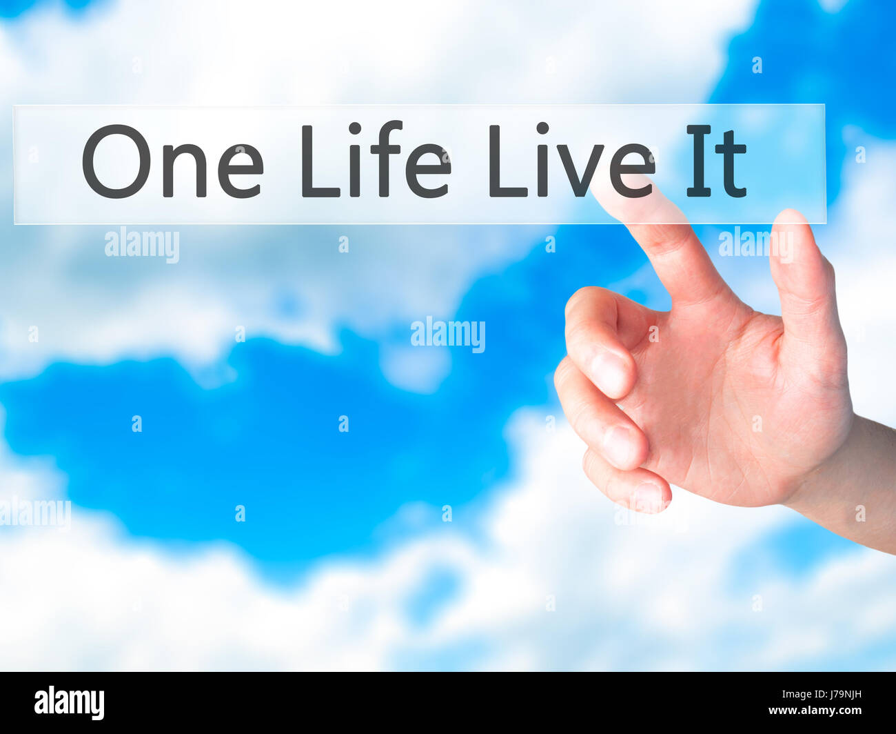 One Life Live It - Hand pressing a button on blurred background concept ...