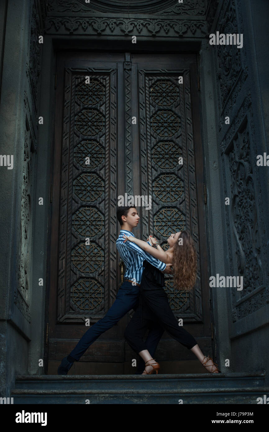 Beautiful young couple dancing whirling dance. See more photos of this ...