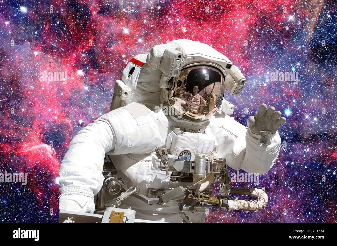 Astronaut in outer space. Elements of this image furnished by NASA ...