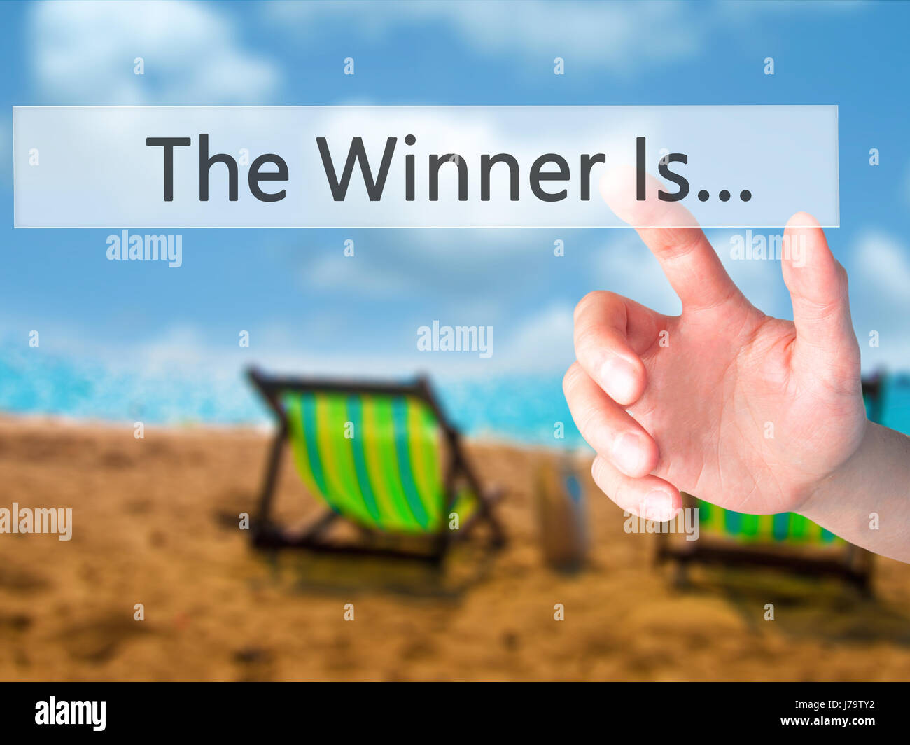 The Winner Is... - Hand pressing a button on blurred background concept ...