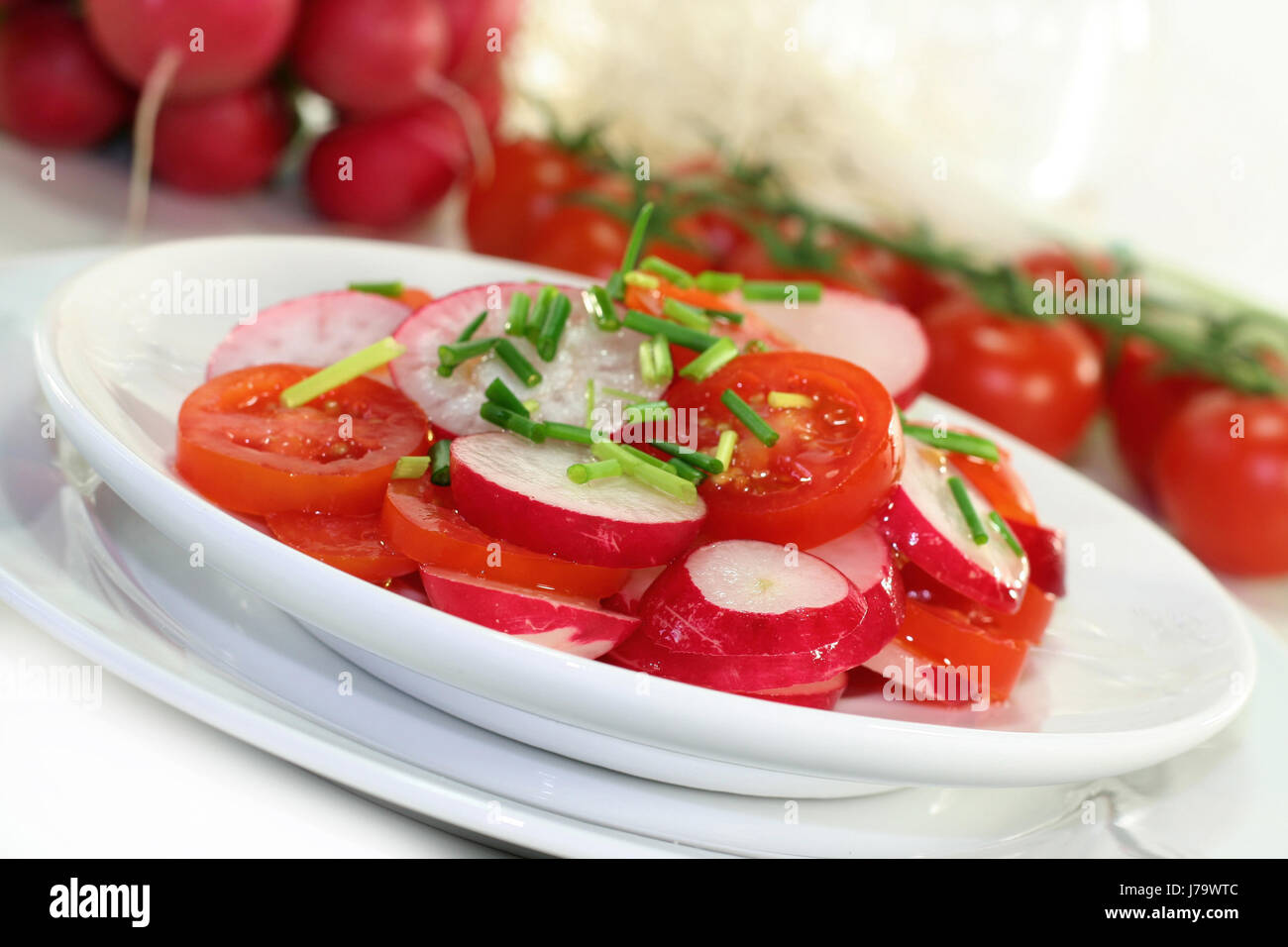 radish and tomato salad Stock Photo - Alamy
