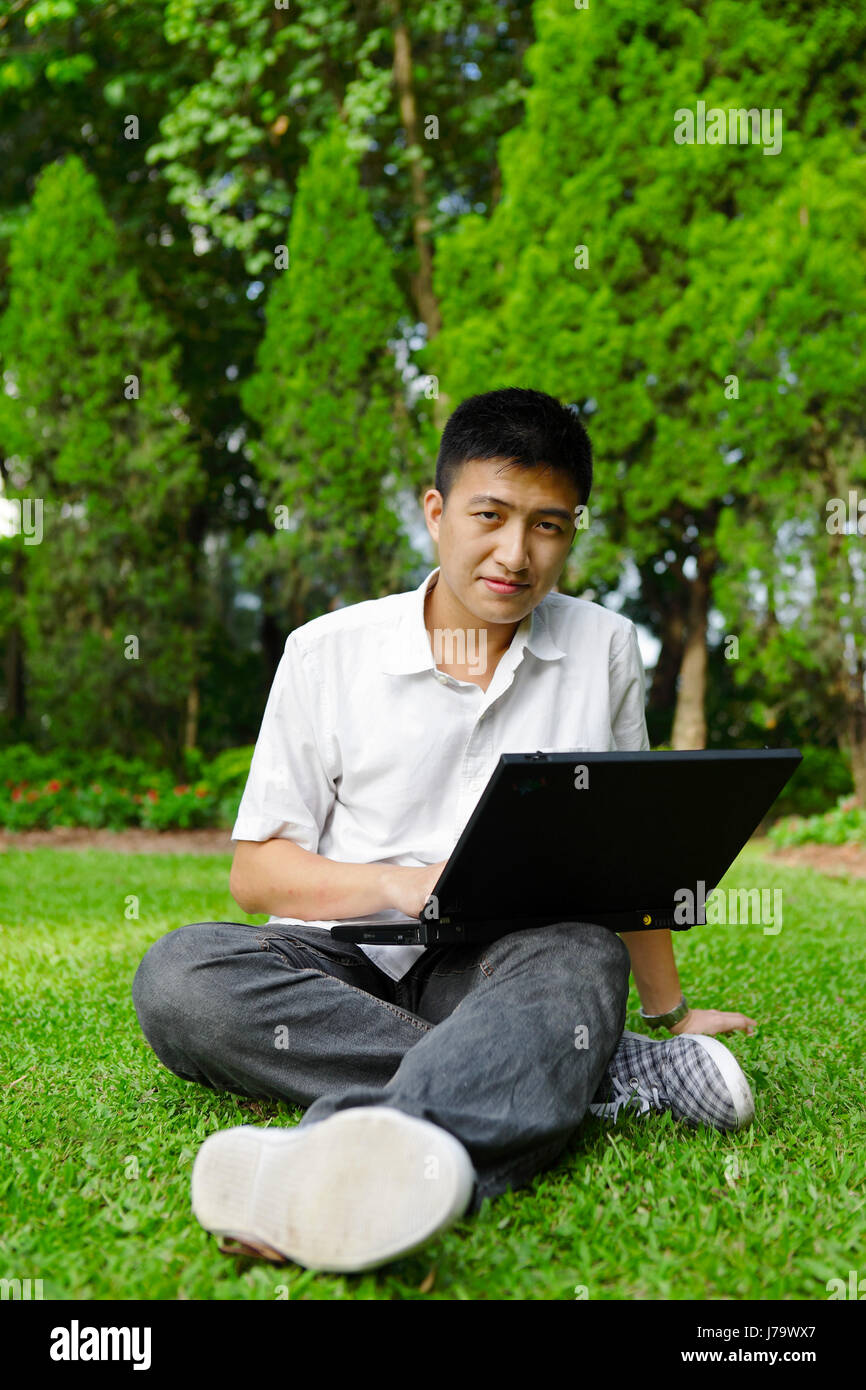 outdoor asian computers computer man blue humans human beings people ...