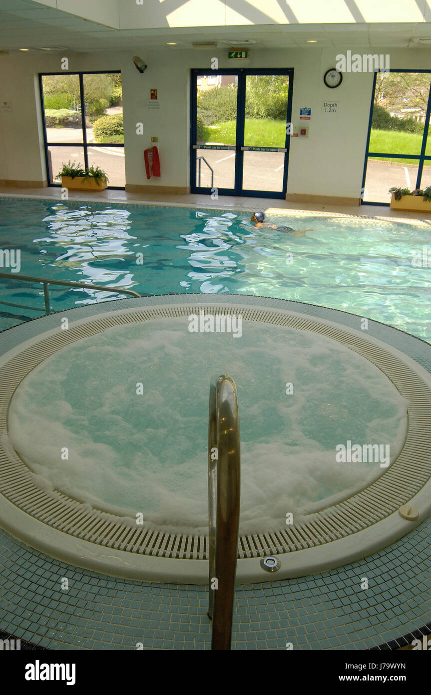 Sports club swimming pool with sunlight reflecting off the water Stock ...