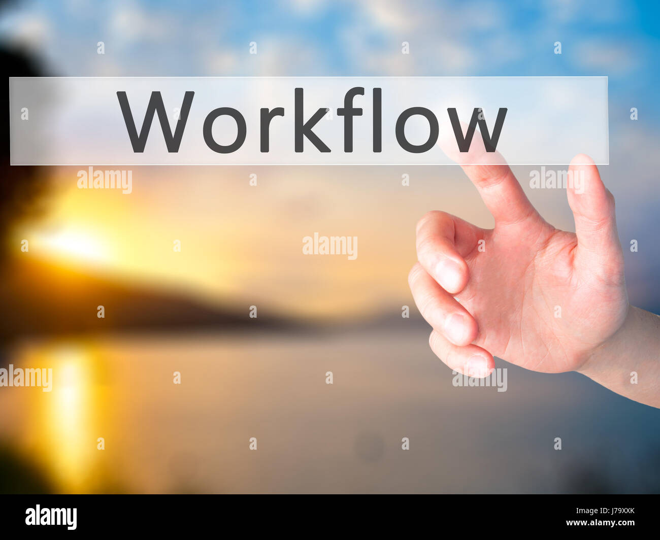 Workflow - Hand pressing a button on blurred background concept ...
