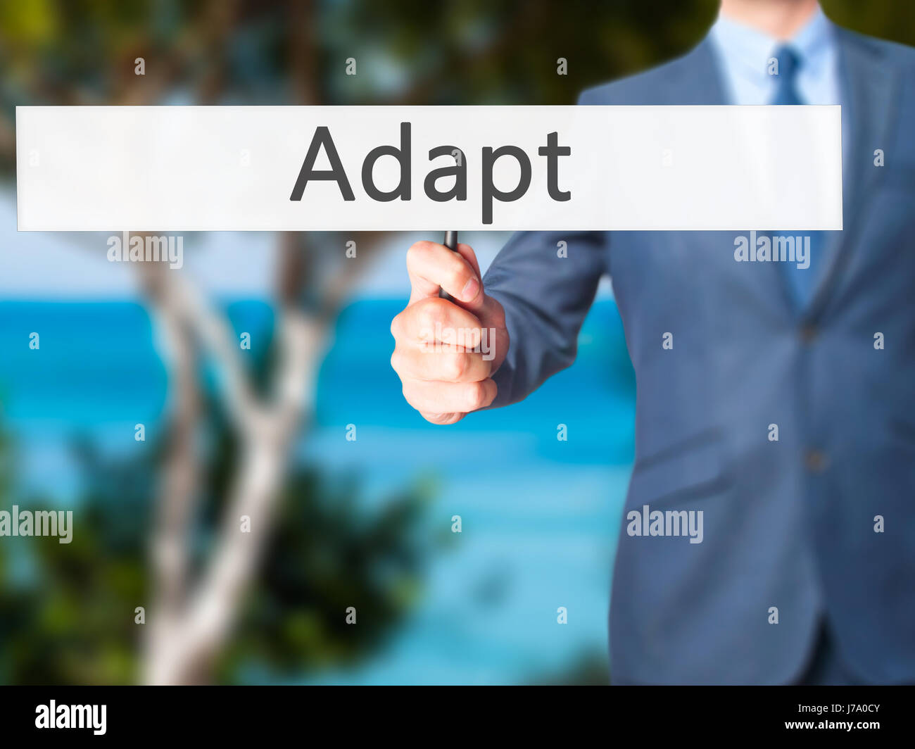 Adapt - Business man showing sign. Business, technology, internet ...