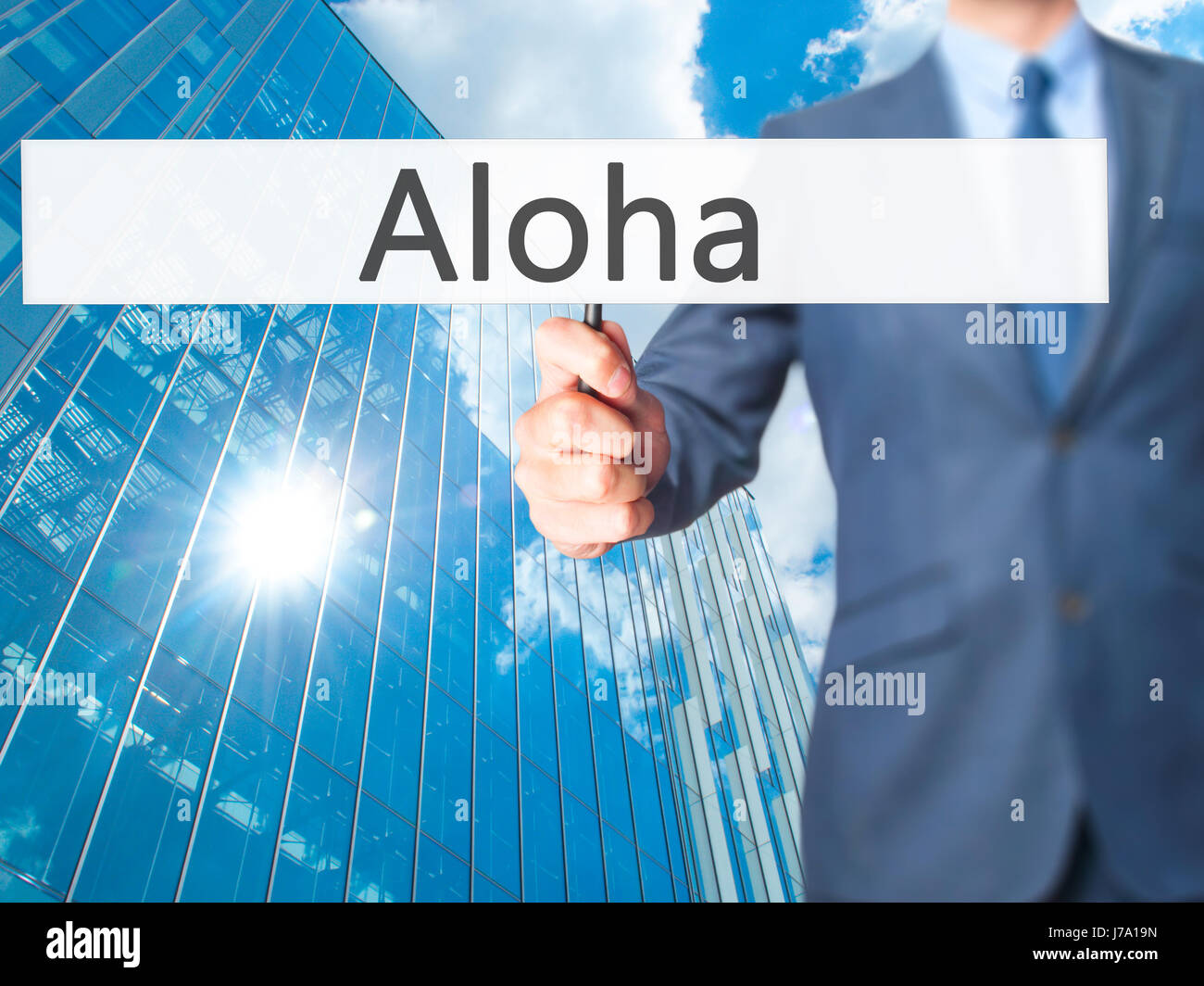 Aloha - Businessman hand holding sign. Business, technology, internet ...