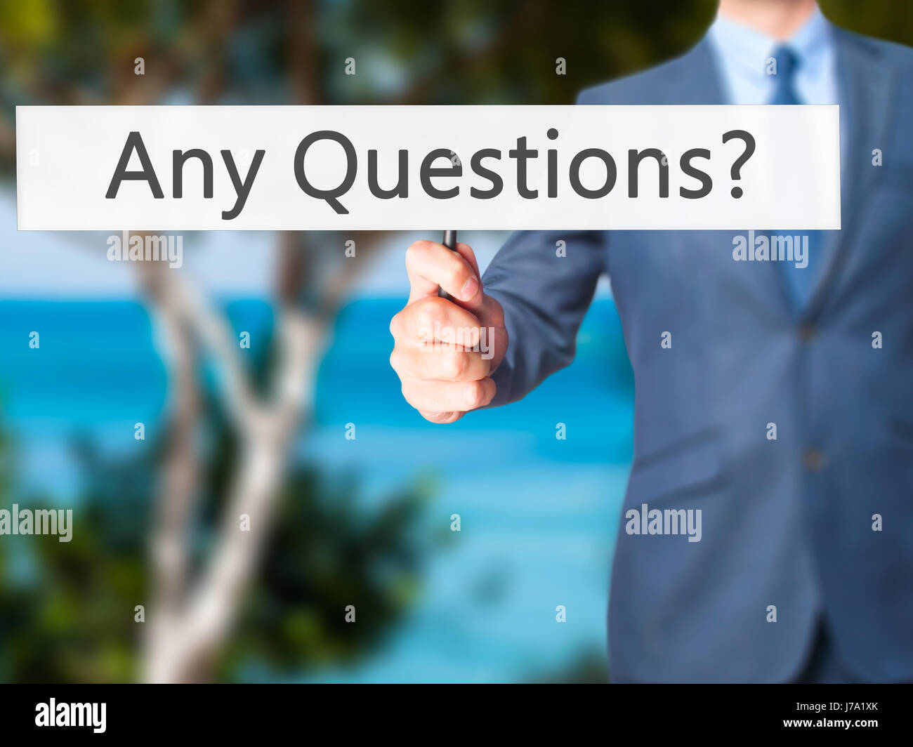 Any Questions - Business man showing sign. Business, technology ...