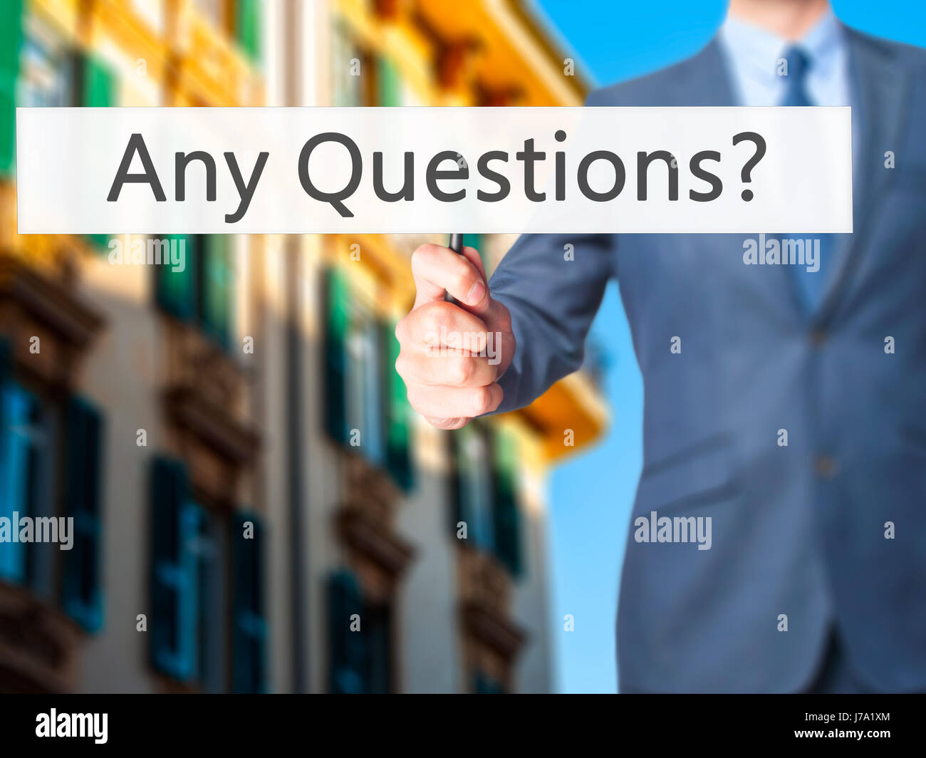 Any Questions - Business man showing sign. Business, technology ...
