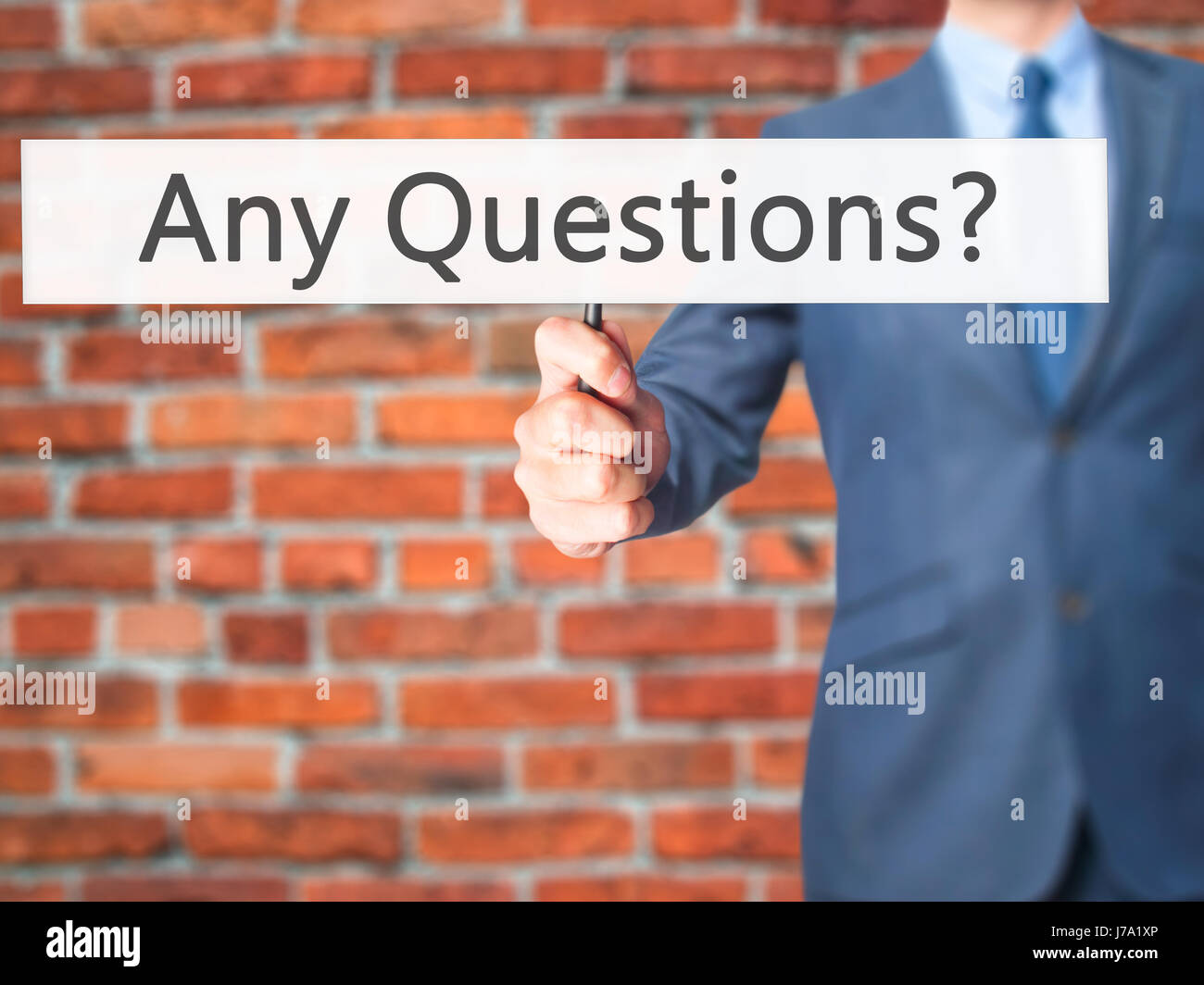Any Questions - Business man showing sign. Business, technology ...