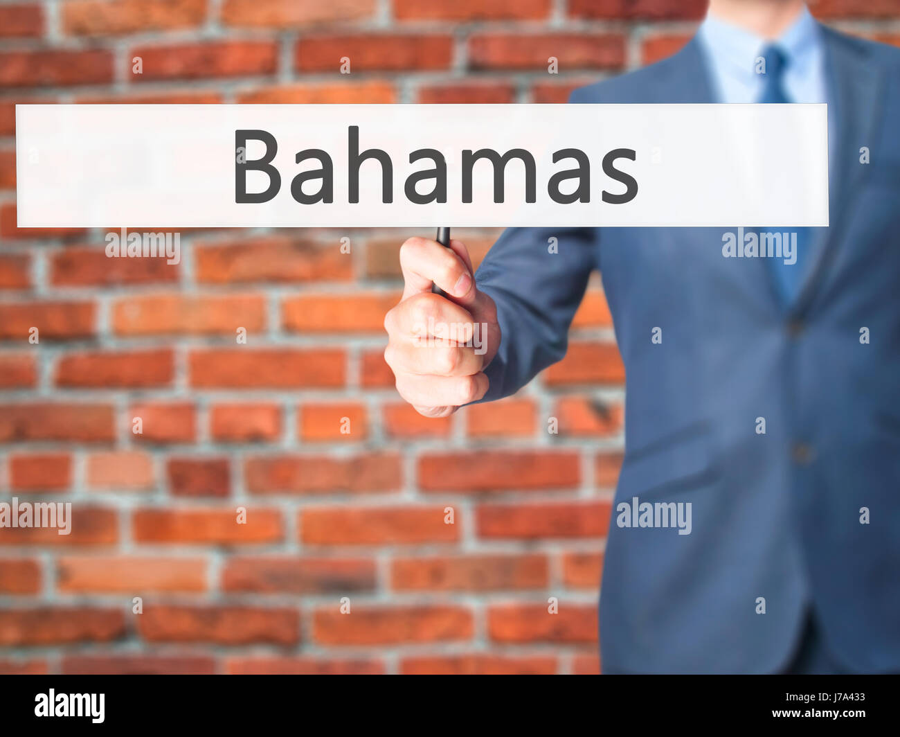 Bahamas - Business man showing sign. Business, technology, internet ...