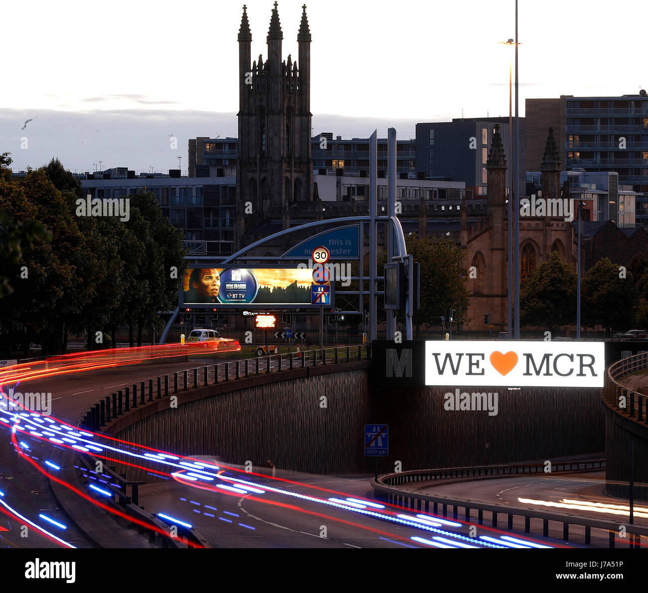 A "We Love Manchester" sign on the Mancunian Way in Manchester, after ...