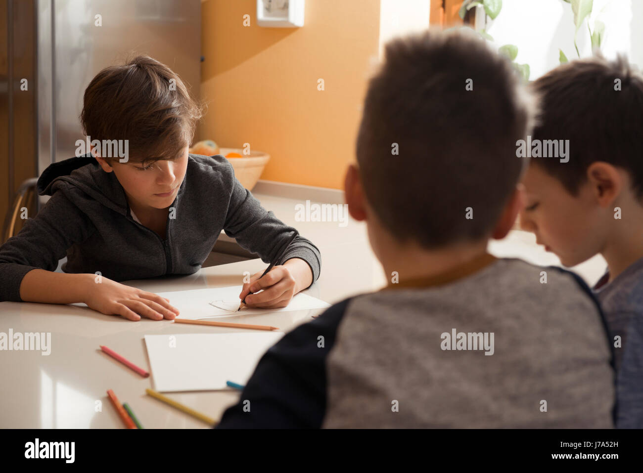 Candid children color pencil drawing hi-res stock photography and ...